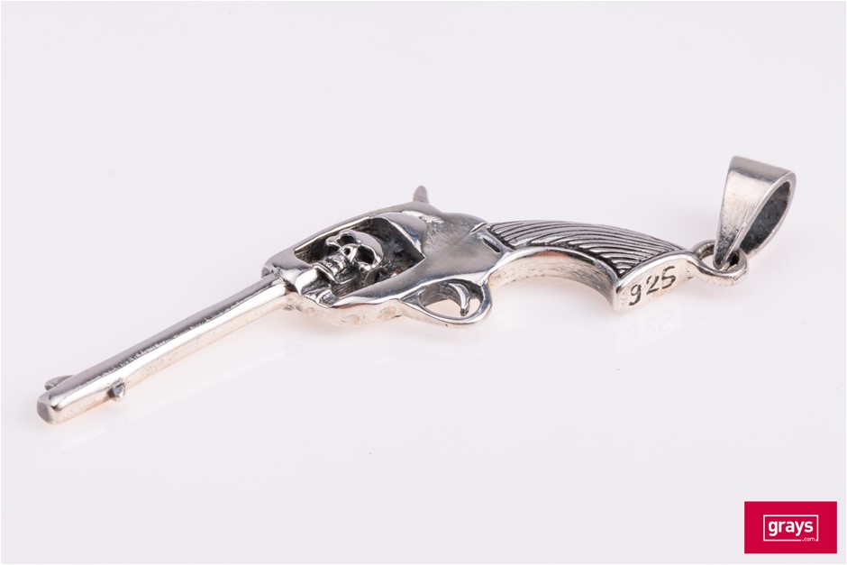 SILVER SKULL GUN PENDANT Auction (1715-2558771) | Grays Australia