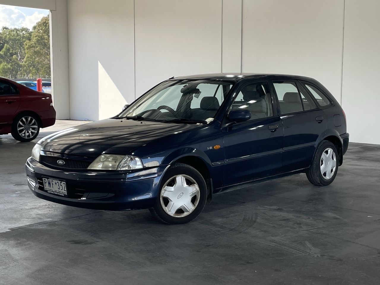 1999 Ford Laser LXi KN Automatic Hatchback Auction (0001-21024599) | Grays Australia