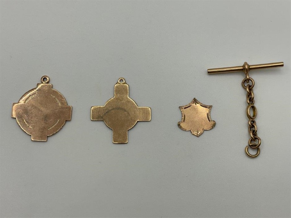 2 x Uninscribed 9Ct Gold medals with detached shield, T bar and chain ...